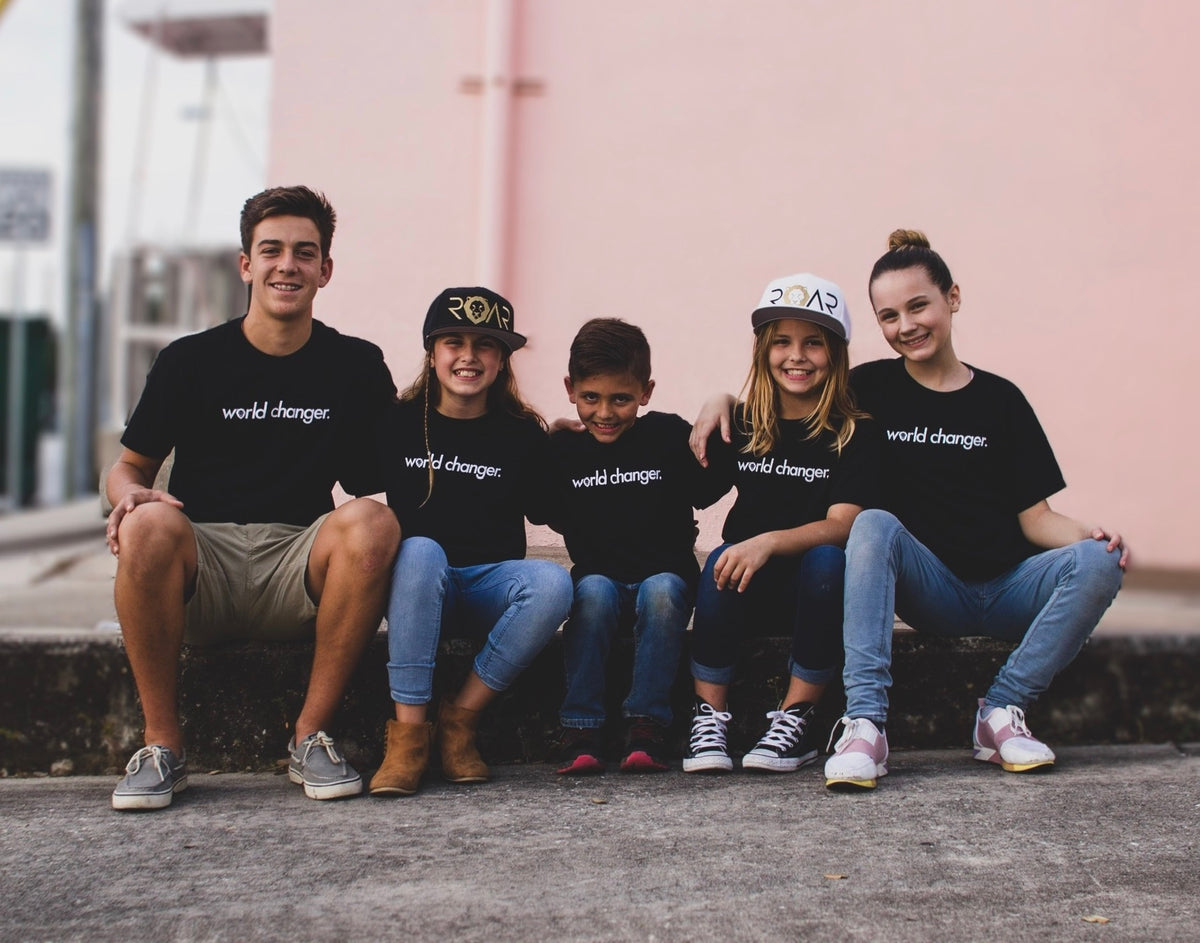 WORLD CHANGER - KIDS AND YOUNG ADULTS T-SHIRT – Watch Us Roar